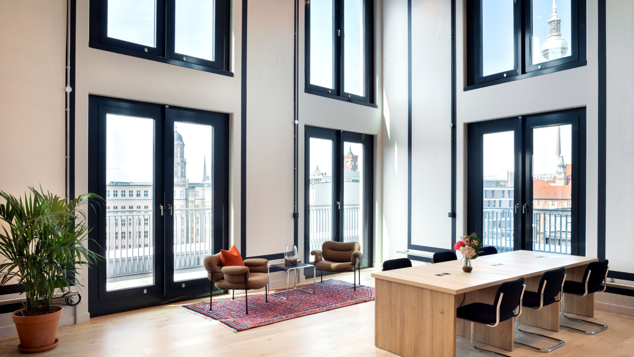 A concrete workspace with soaring windows in Berlin